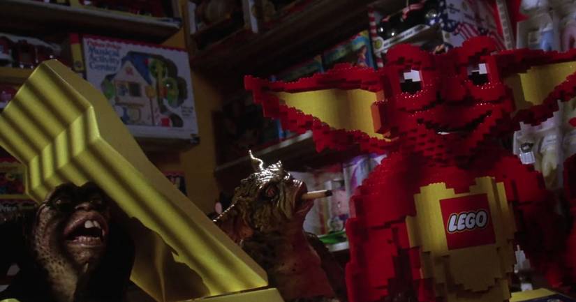 How Gremlins 2 Attacks Companies and Film Studios Like Warner Bros.